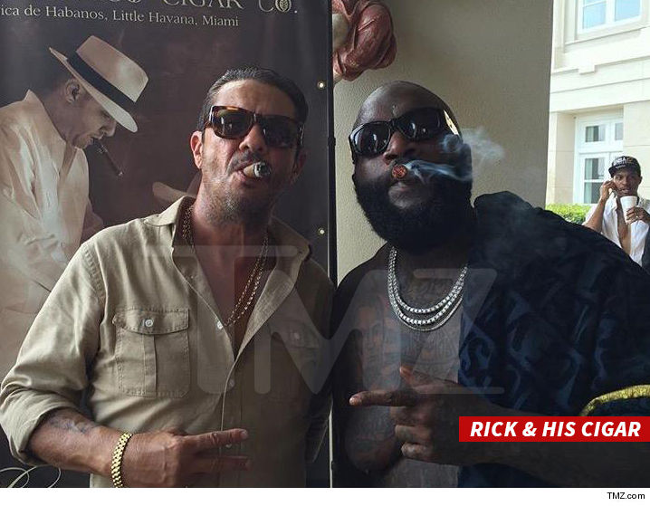 Rick Ross Smoking Cigar